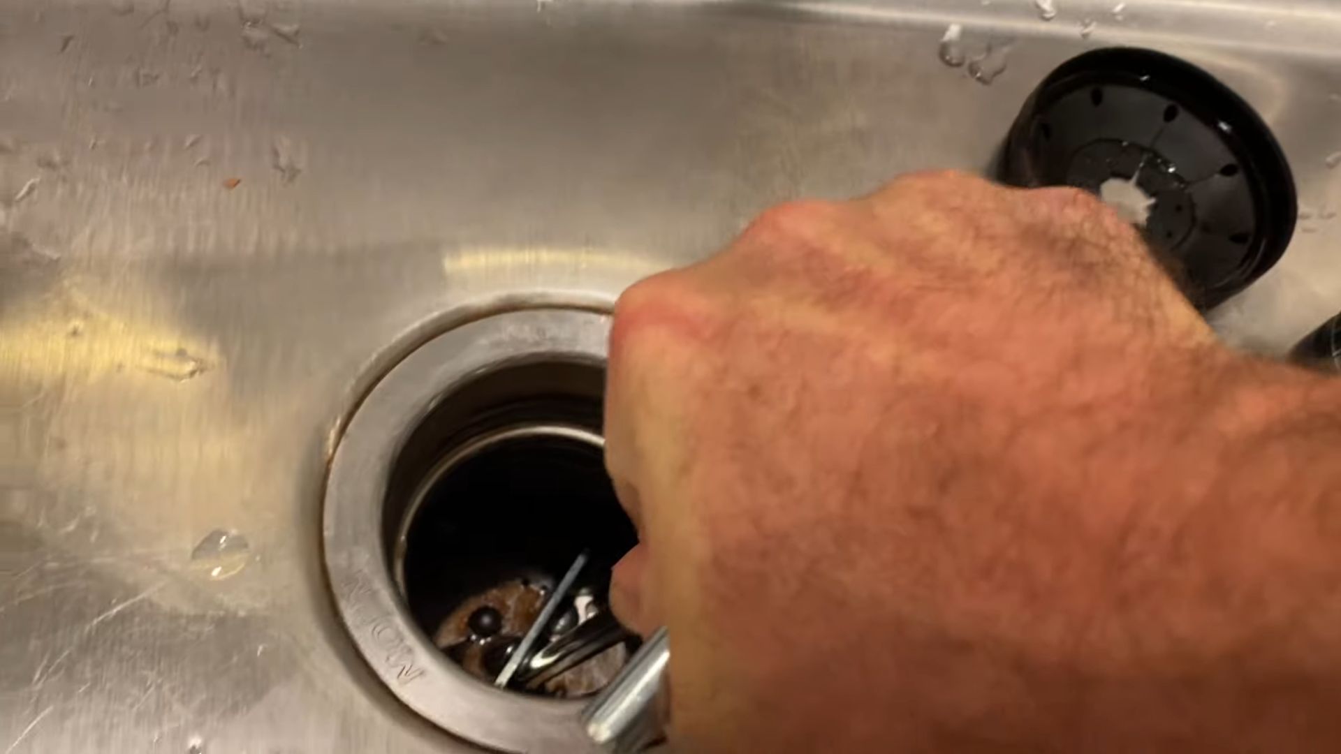 Moen Garbage Disposal Stuck: Reasons & Solutions